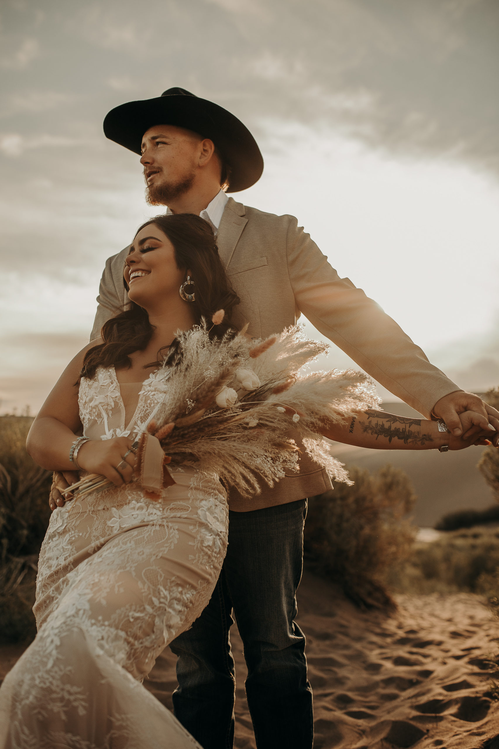 EMILY + LUKE SAND DUNE ELOPEMENT - westernweddingmagazine.com